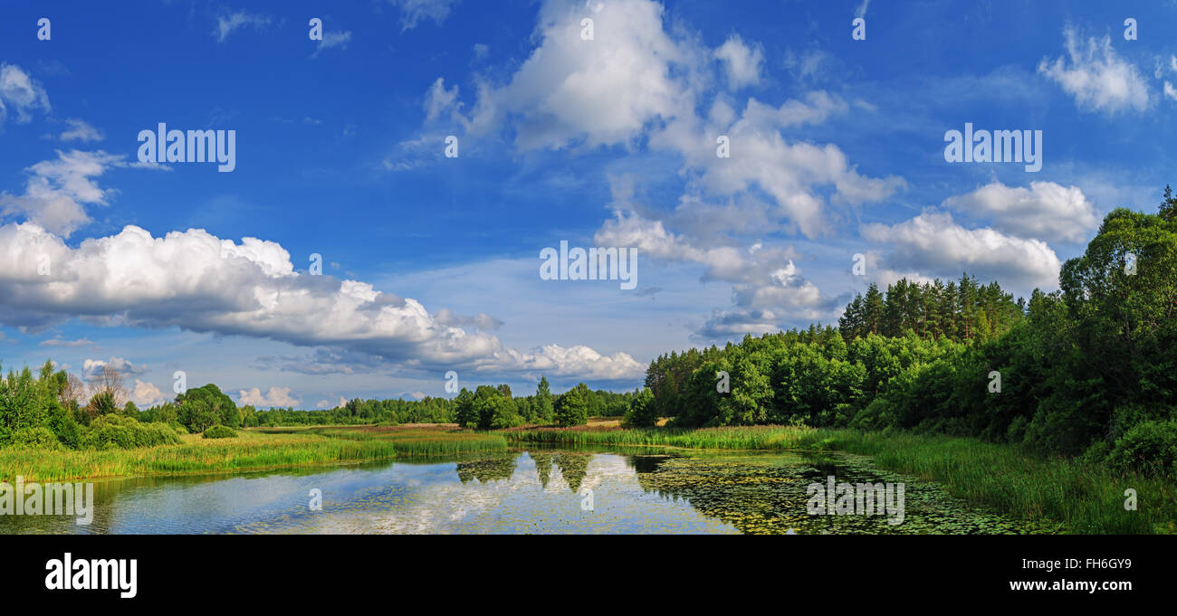 Clouds over river Stock Photo - Alamy