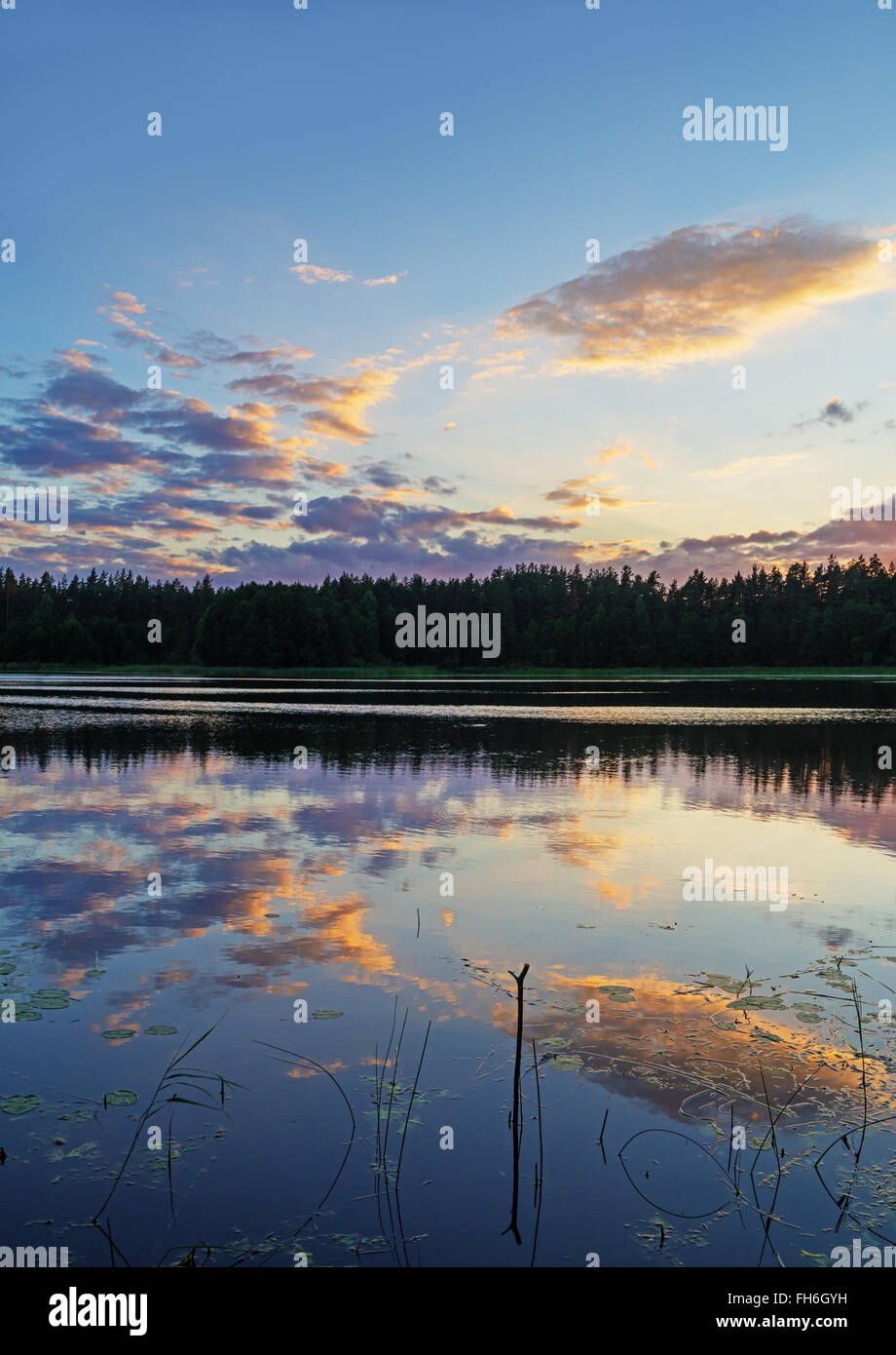 Pink sunset over lake Stock Photo - Alamy
