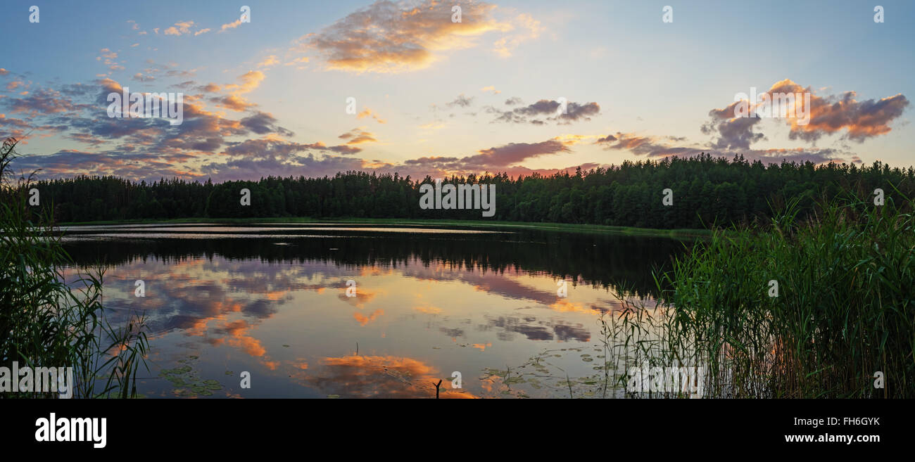 Pink sunset over lake Stock Photo - Alamy