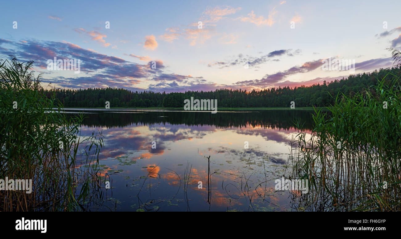 Pink sunset over lake Stock Photo - Alamy