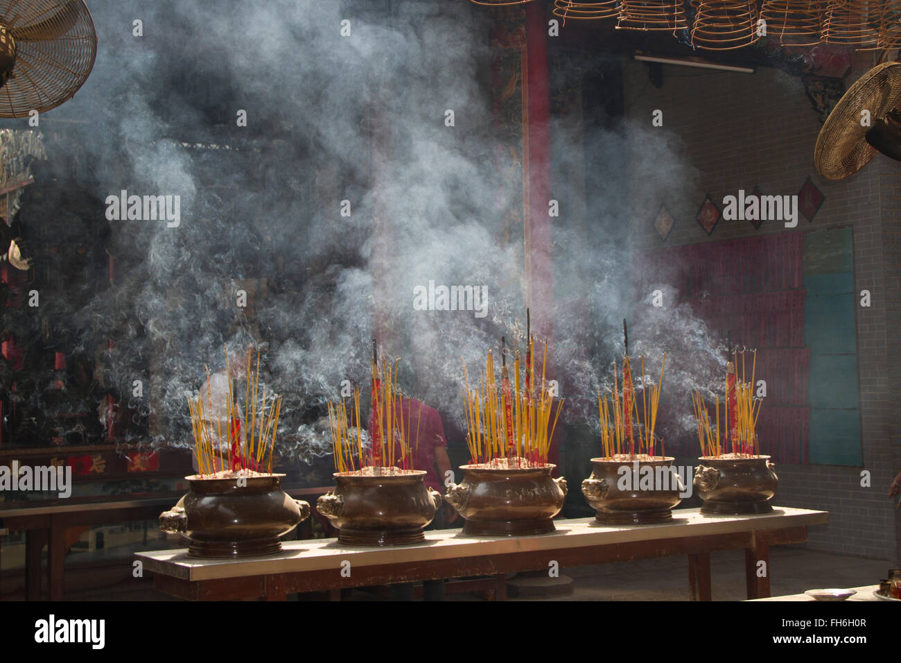 Incense smoke fills the air in a Chinatown pagoda Ho Chi Minh City ...