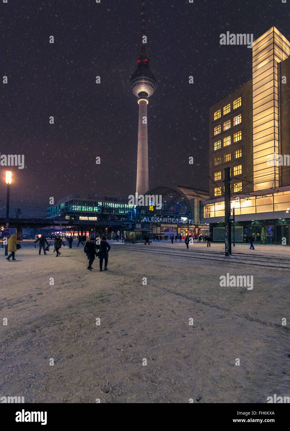 Germany, Berlin, view to television tower at snow fall in the evening ...