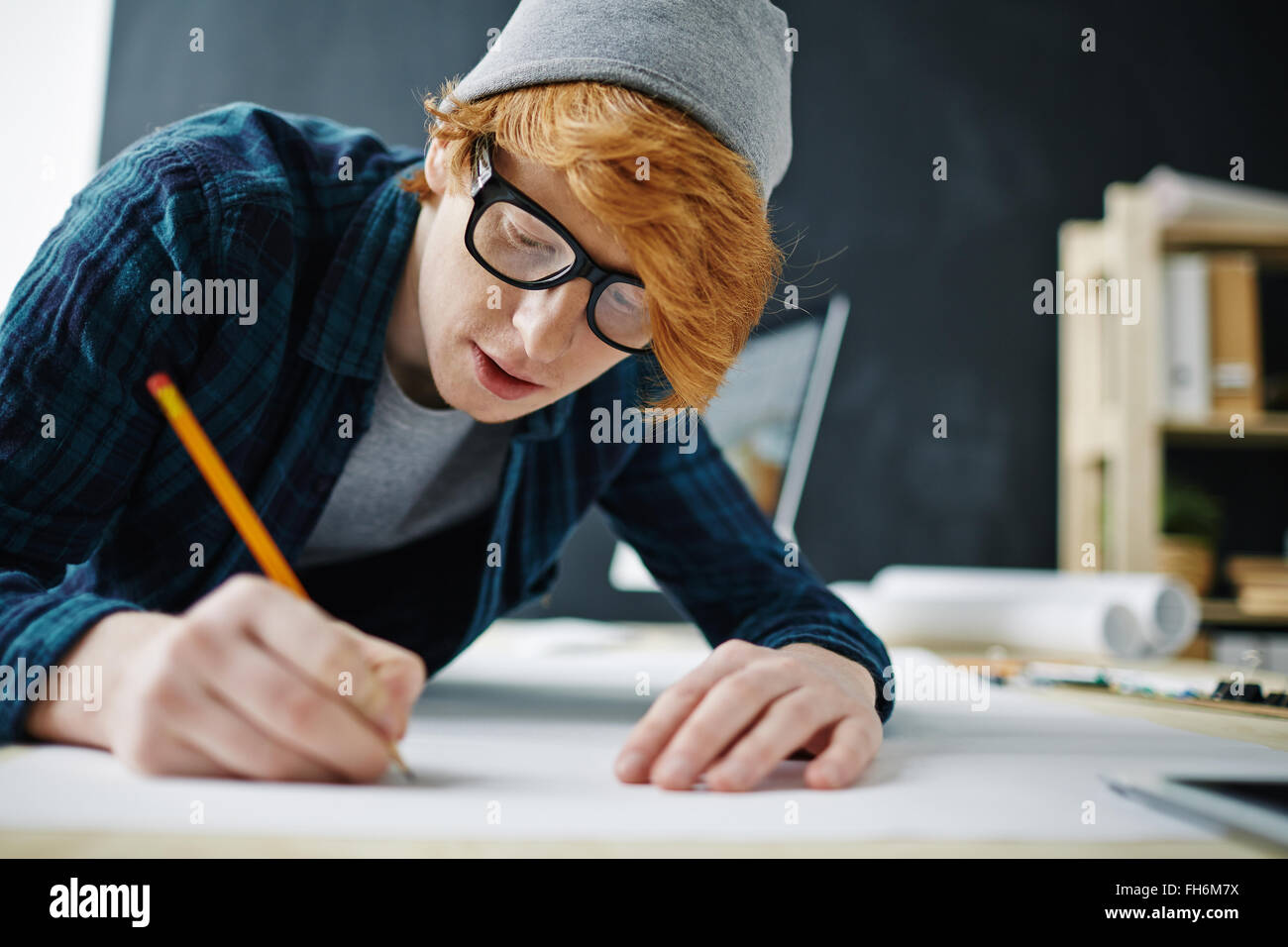 Handsome architect making sketch of construction or interior Stock ...