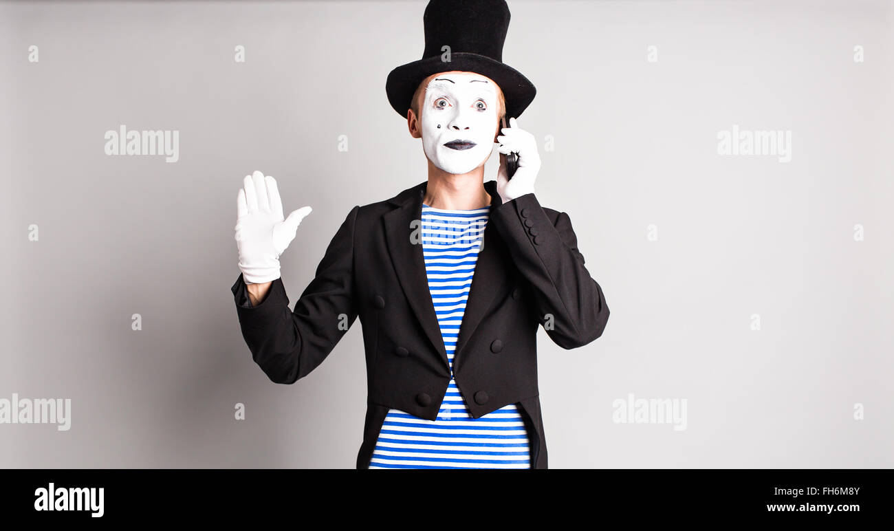 Man mime talking on his cell phone. April Fool's Day concept Stock ...