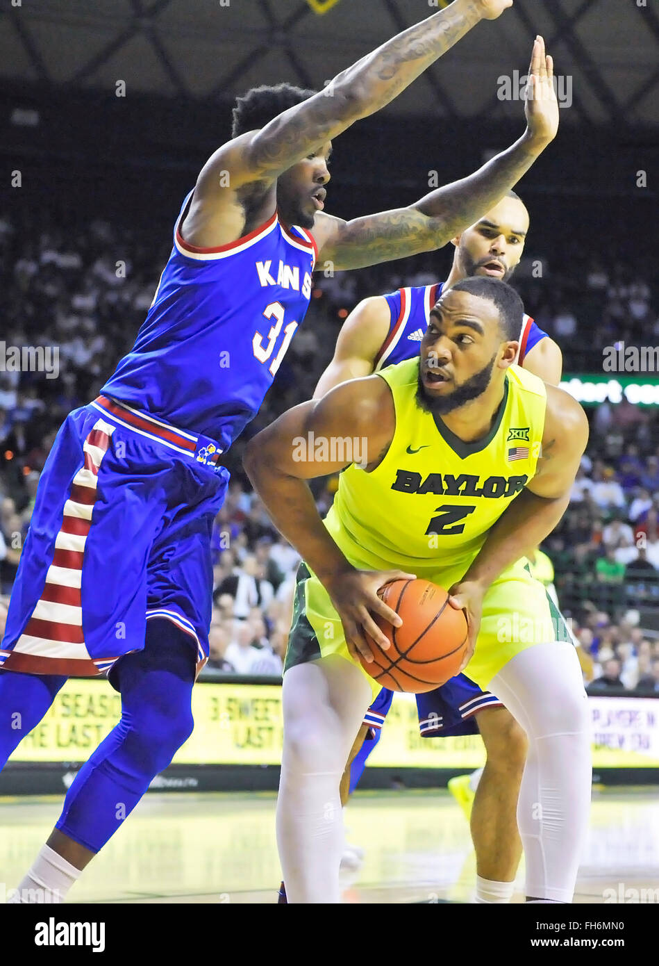 February 23, 2016: Kansas forward Jamari Traylor (31) tries to block a ...