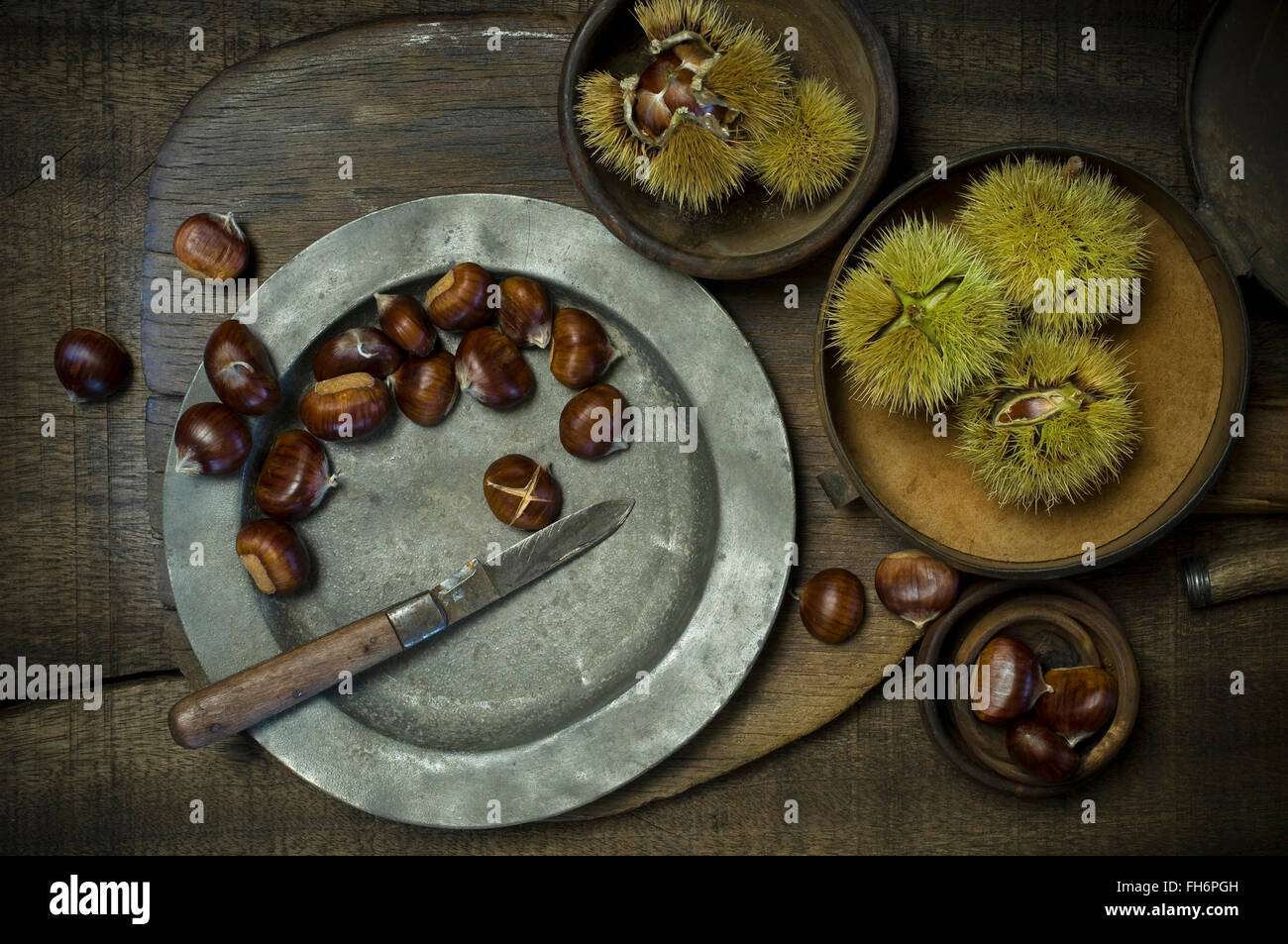 Preparing sweet chestnuts Stock Photo - Alamy