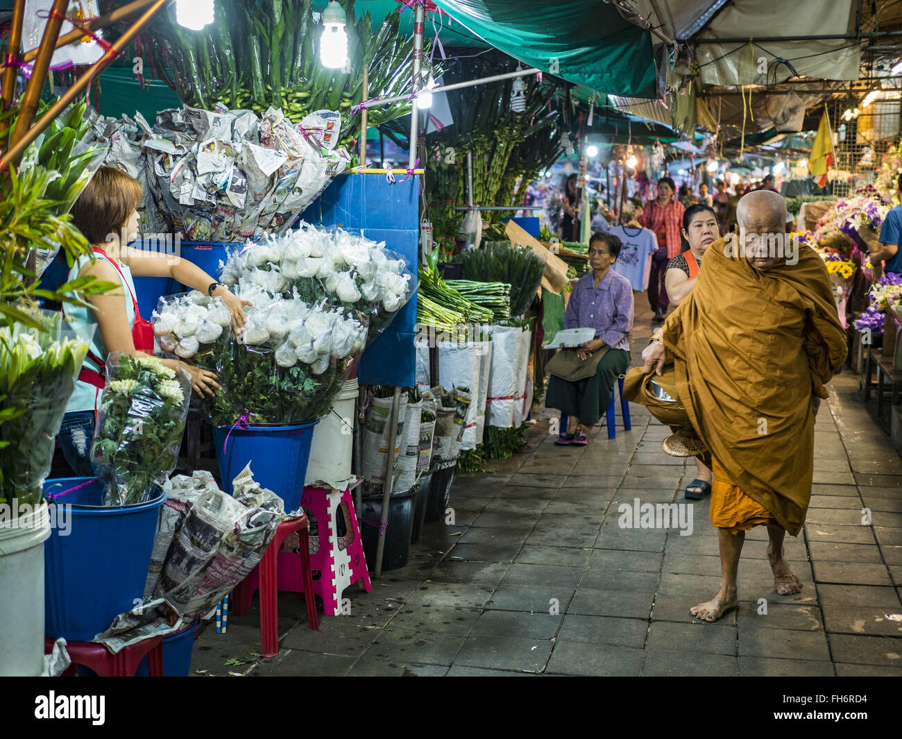 Buddhist monk walks in front hi-res stock photography and images - Alamy