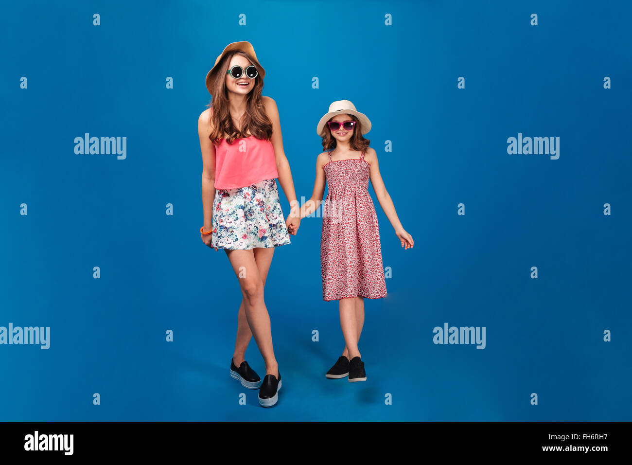 Portrait two beautiful sisters smiling hi-res stock photography and ...