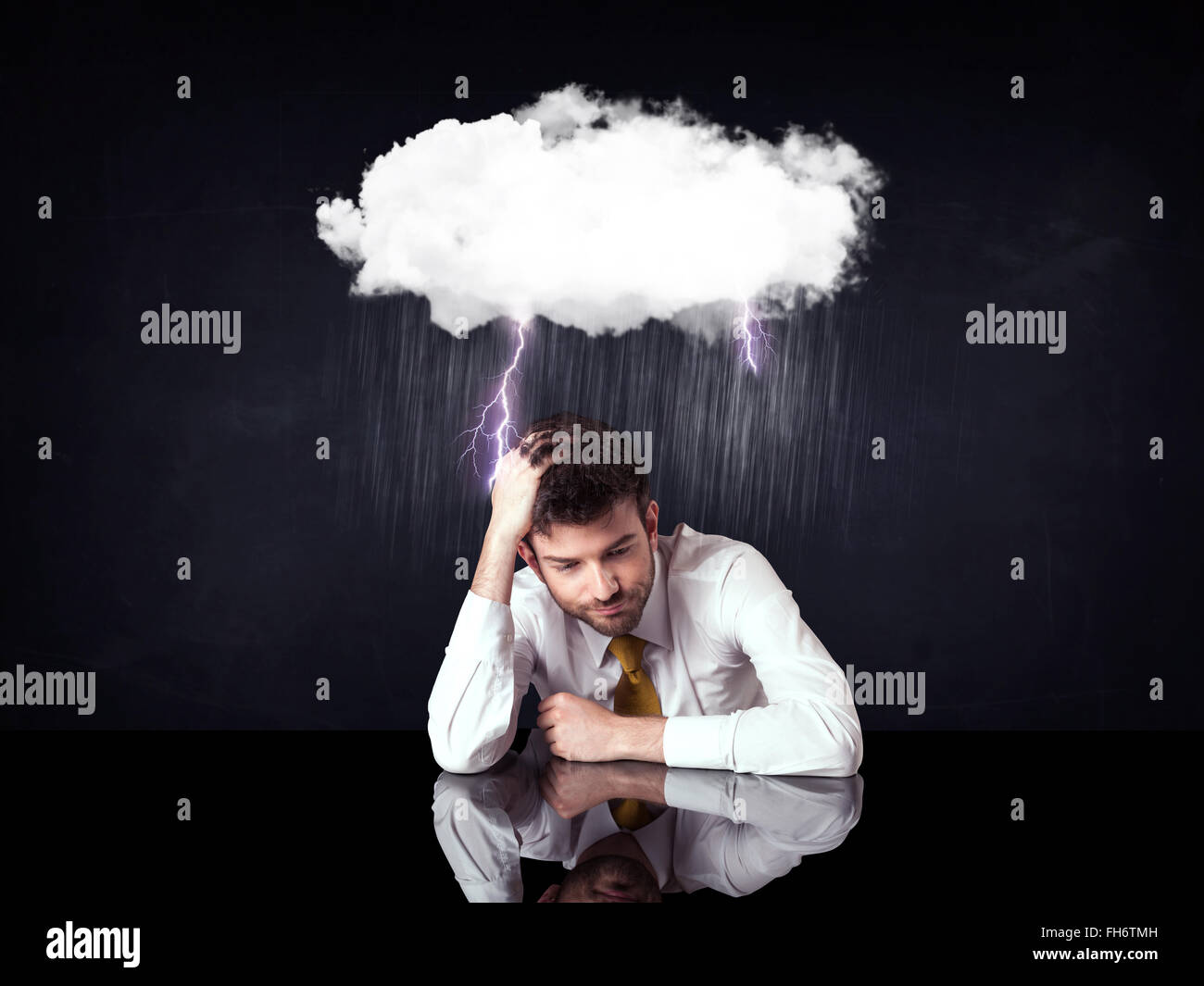 Sad man sitting under rain hi-res stock photography and images - Alamy