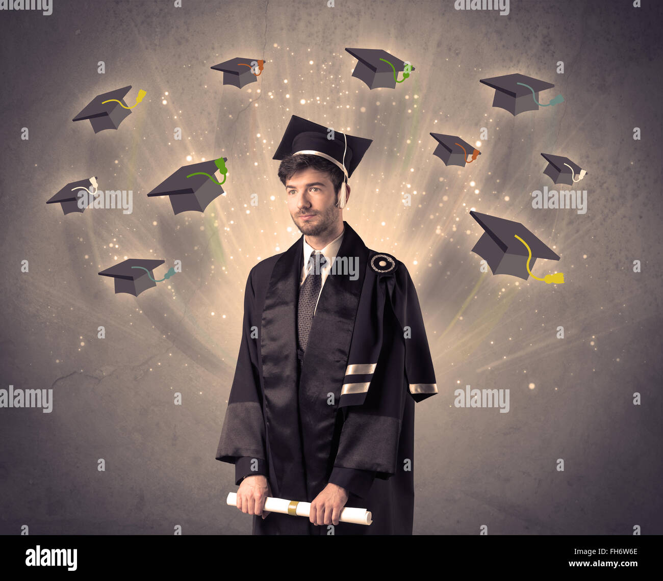 College graduate with many flying hats Stock Photo - Alamy