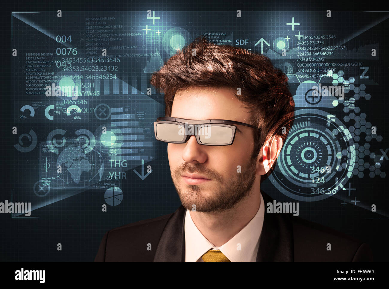 Young man looking with futuristic smart high tech glasses Stock Photo ...