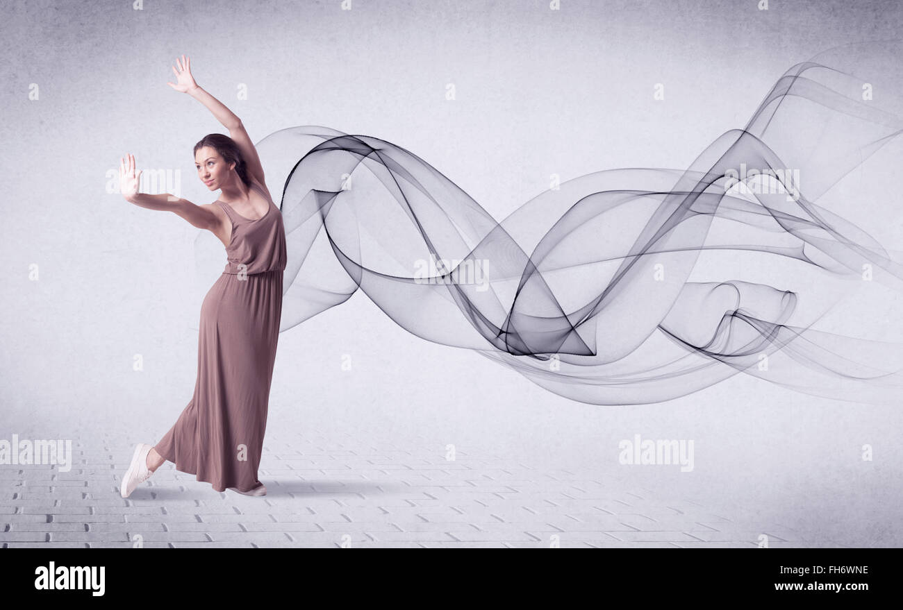 Modern ballet dancer performing with abstract swirl Stock Photo - Alamy