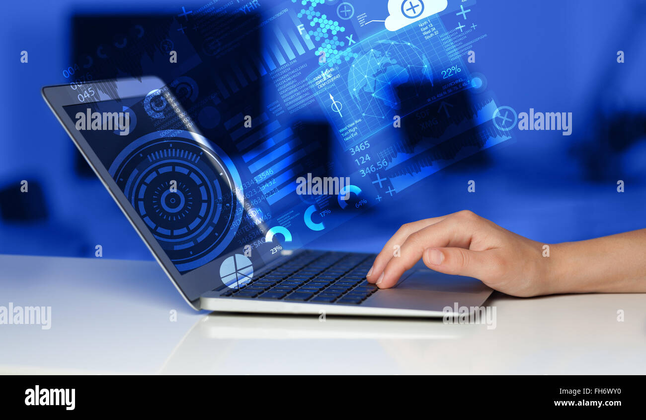 Modern notebook computer with future technology symbols Stock Photo - Alamy