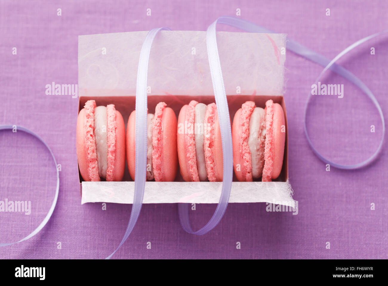 Pink macarons in a box Stock Photo - Alamy