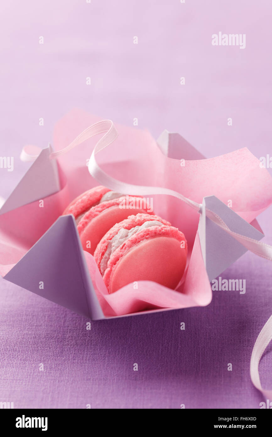 Pink macarons in a box Stock Photo - Alamy