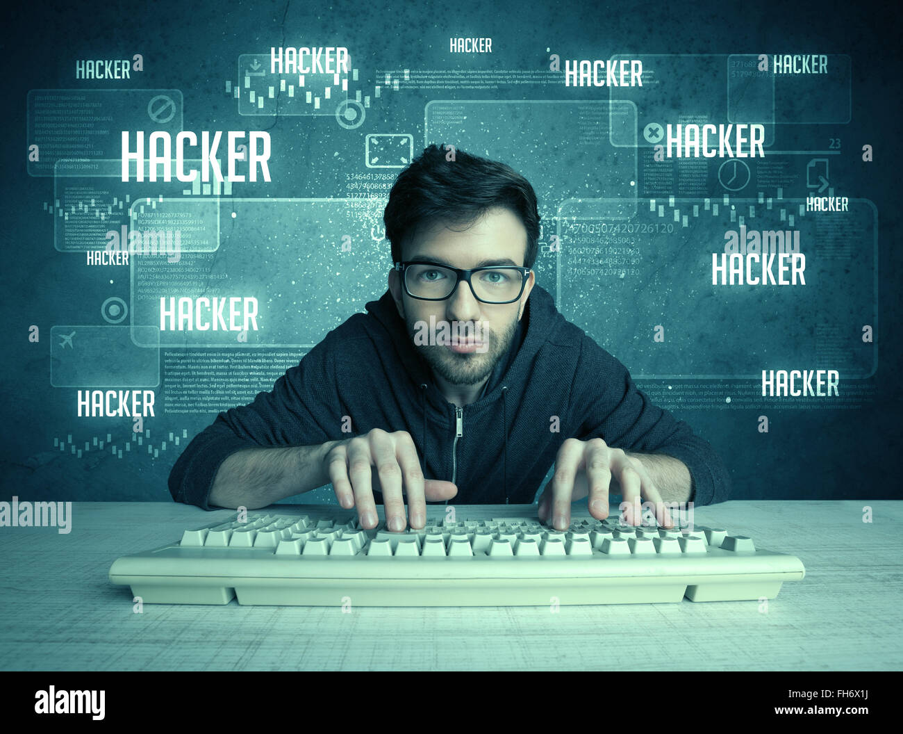 Hacker with keyboard and glasses Stock Photo - Alamy