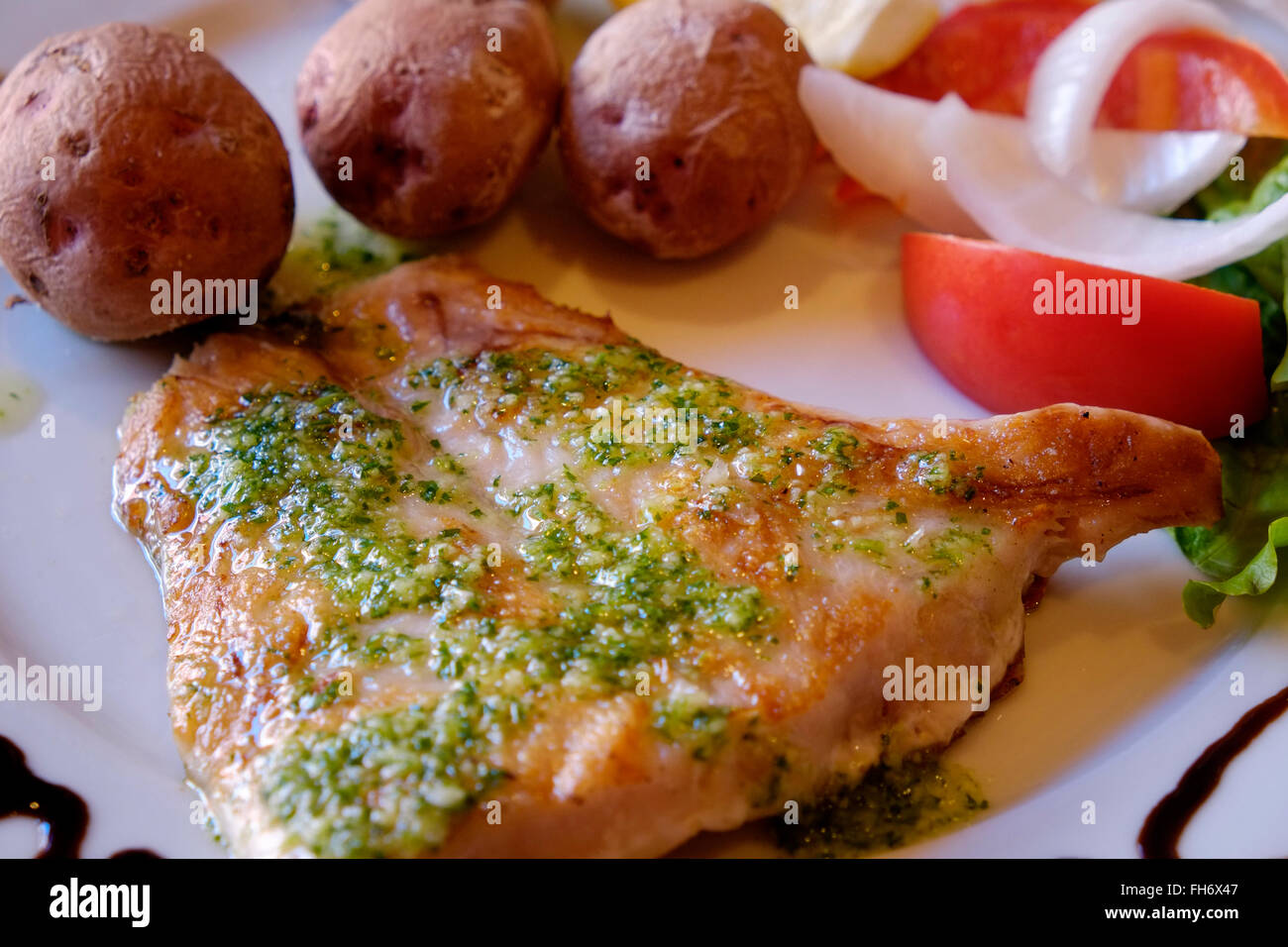 Green mojo verde sauce over Haddock fish served with Papas arrugadas or ...