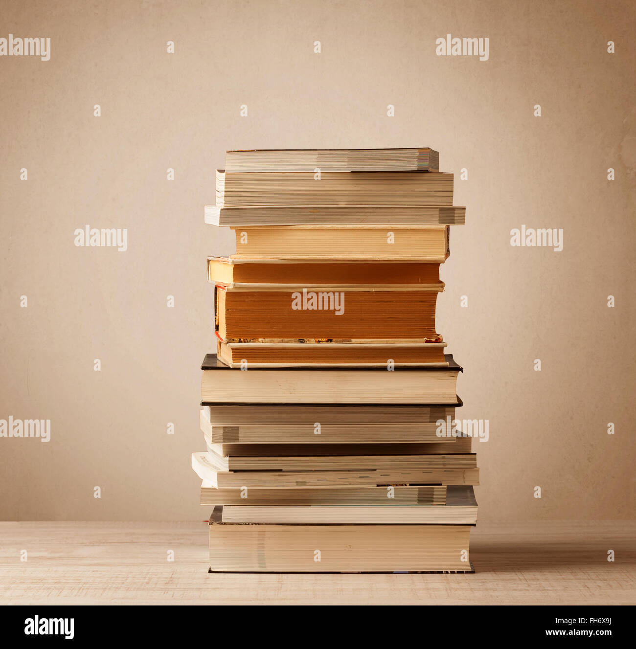 A stack of books with vintage background Stock Photo - Alamy