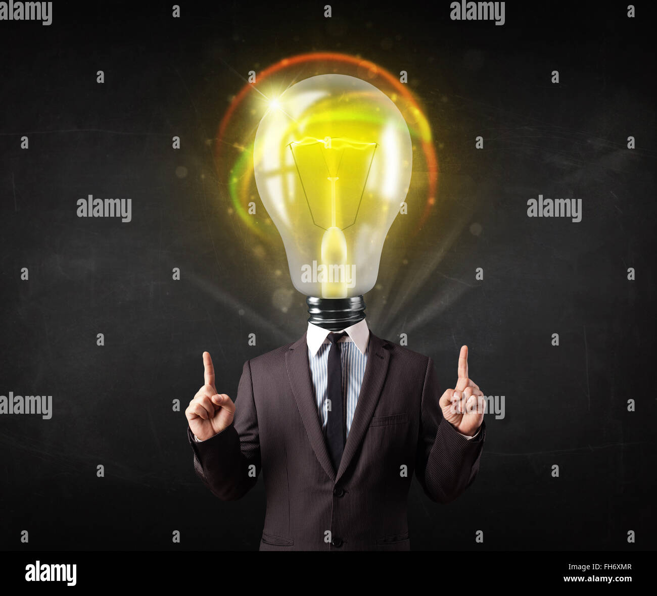 Business man with light bulb head concept Stock Photo - Alamy