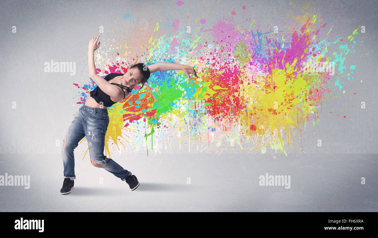Young colorful street dancer with paint splash Stock Photo - Alamy
