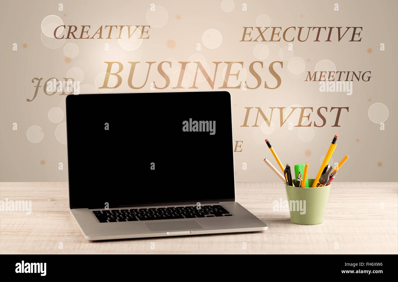 Business office desk with writing on wall Stock Photo - Alamy