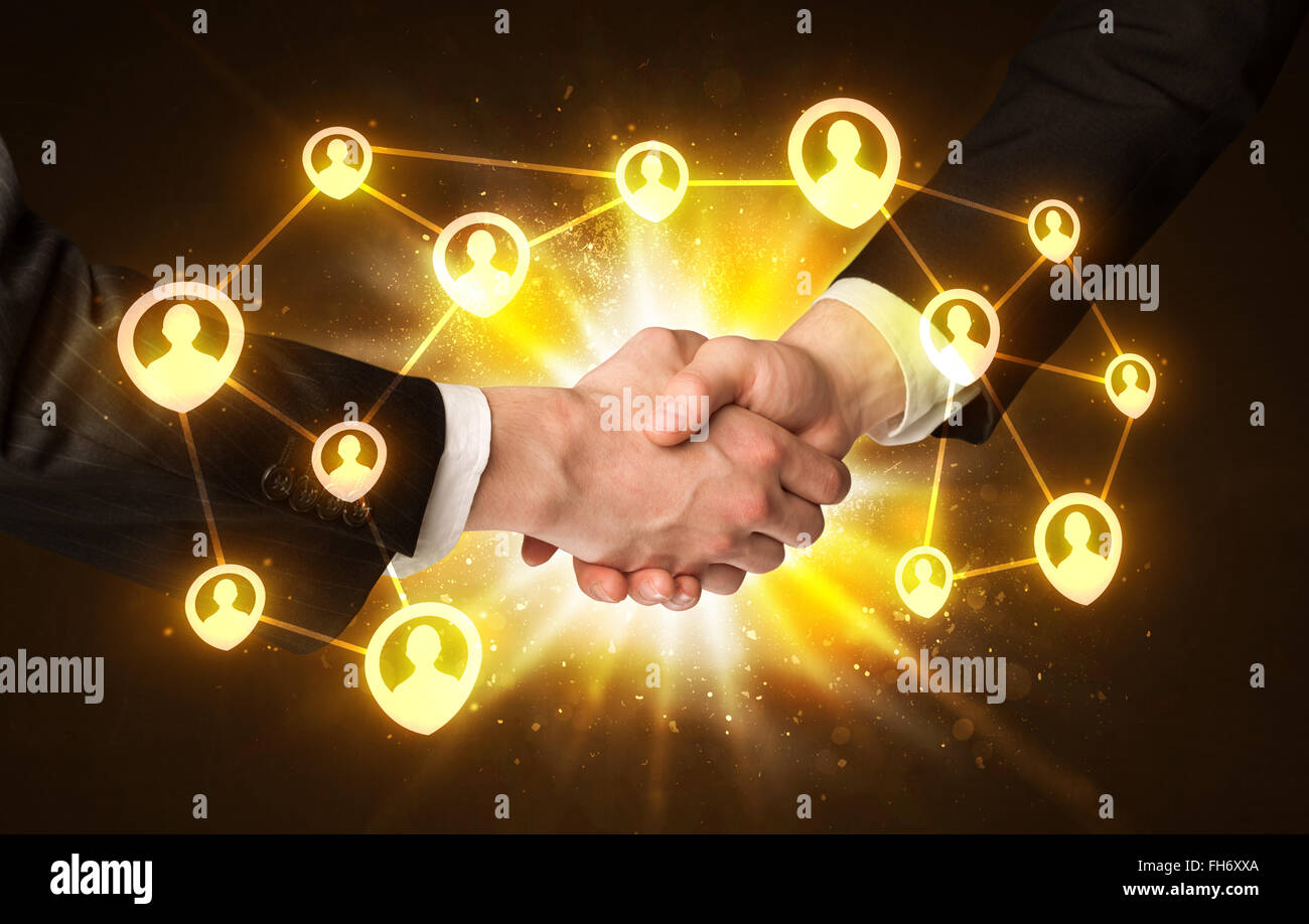 Social netwok connection handshake Stock Photo - Alamy