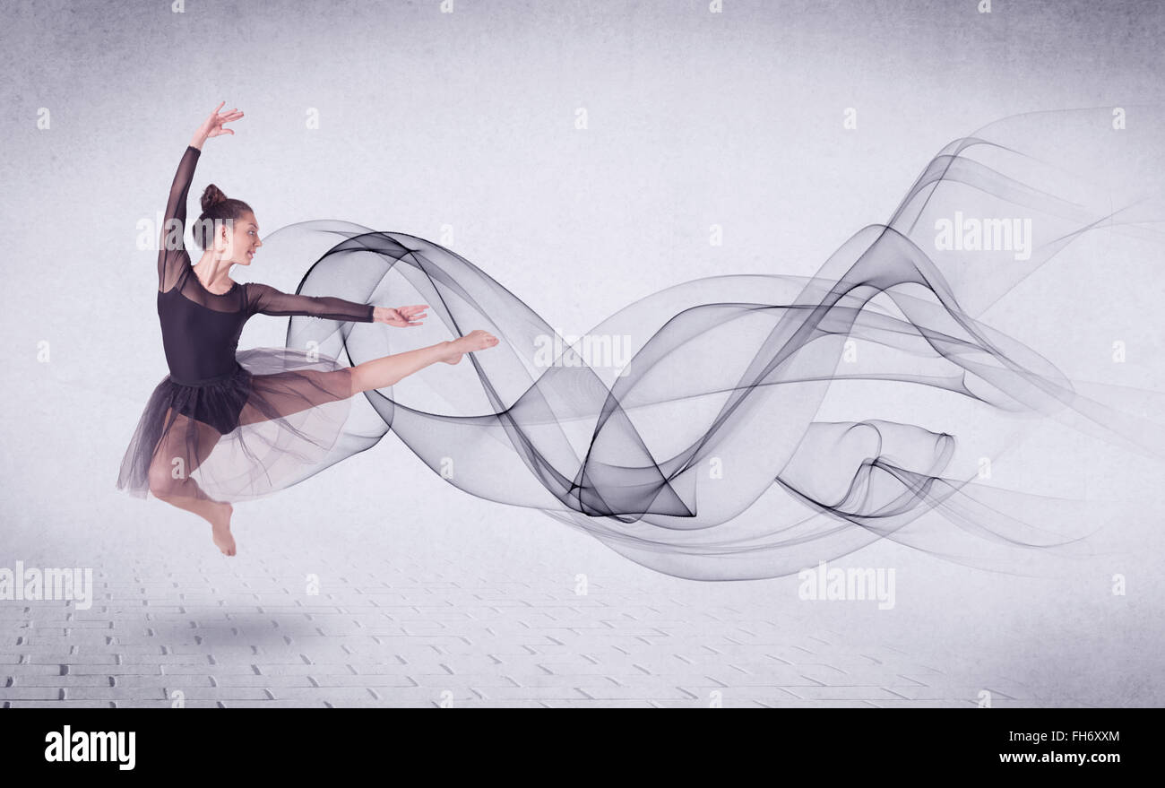 Modern ballet dancer performing with abstract swirl Stock Photo - Alamy