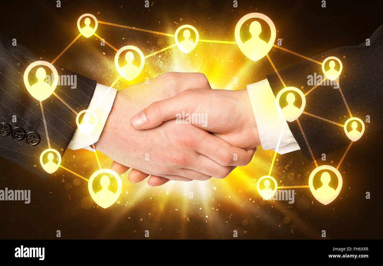 Social netwok connection handshake Stock Photo - Alamy