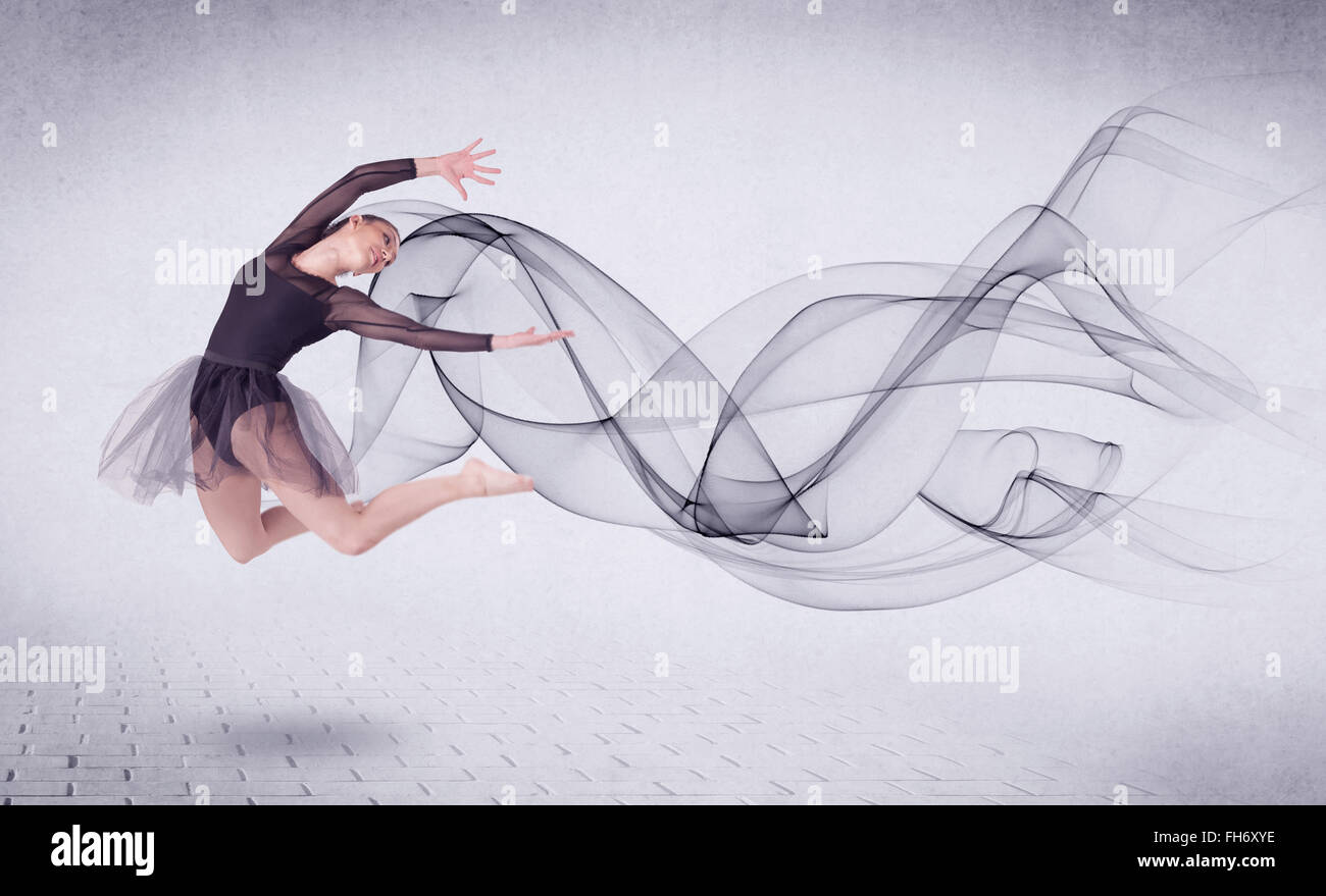 Modern ballet dancer performing with abstract swirl Stock Photo - Alamy