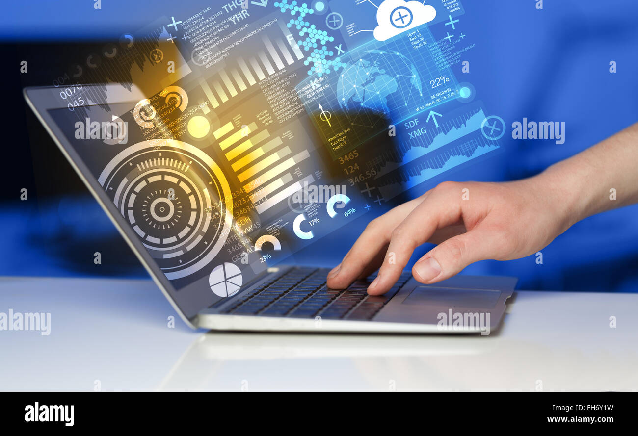 Modern notebook computer with future technology symbols Stock Photo - Alamy