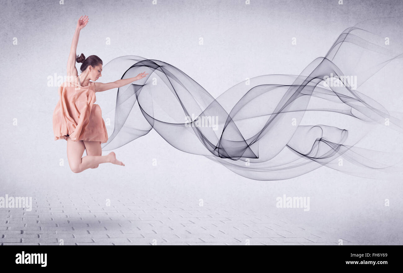 Modern ballet dancer performing with abstract swirl Stock Photo - Alamy