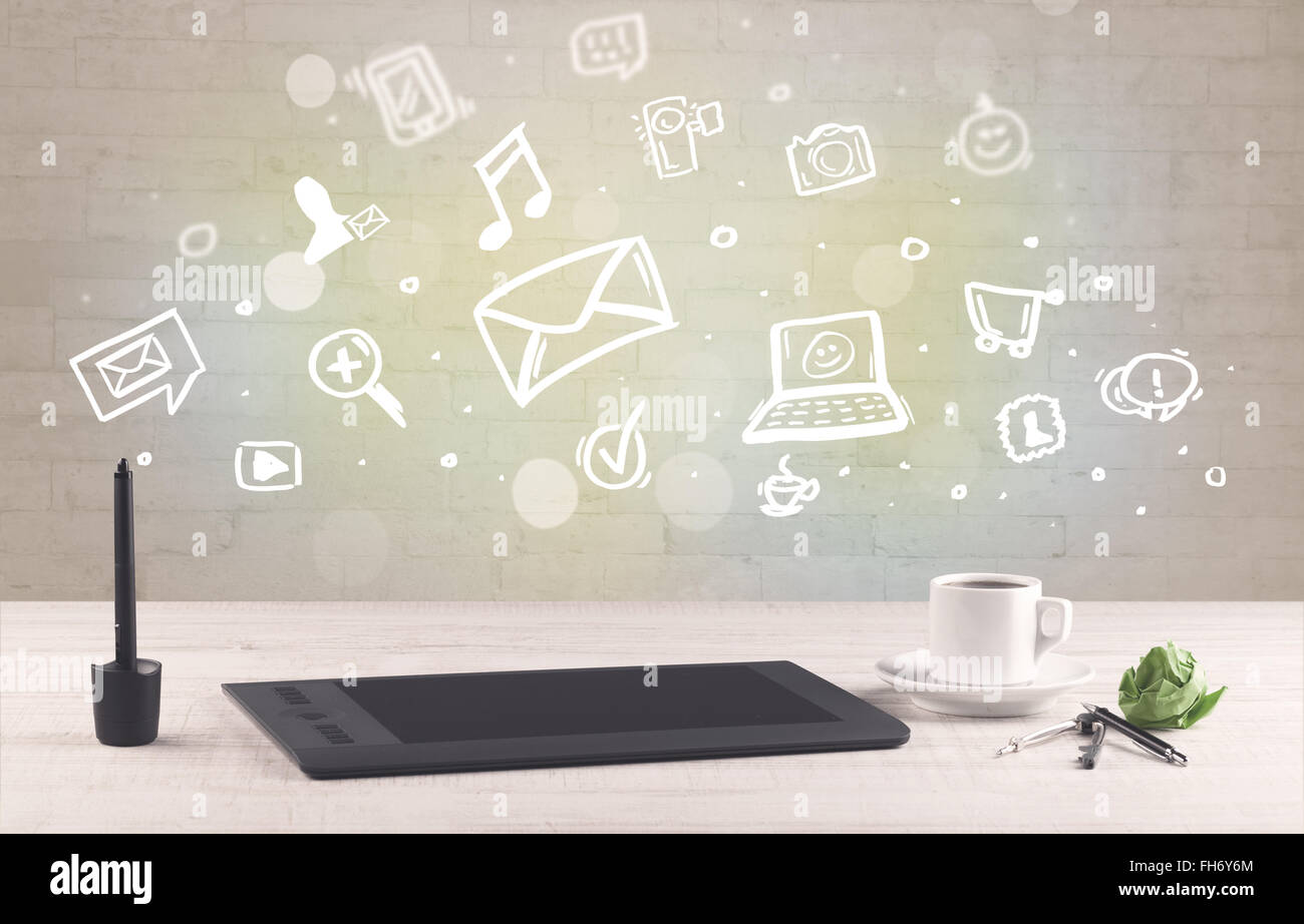 Office desk with communication icons Stock Photo - Alamy