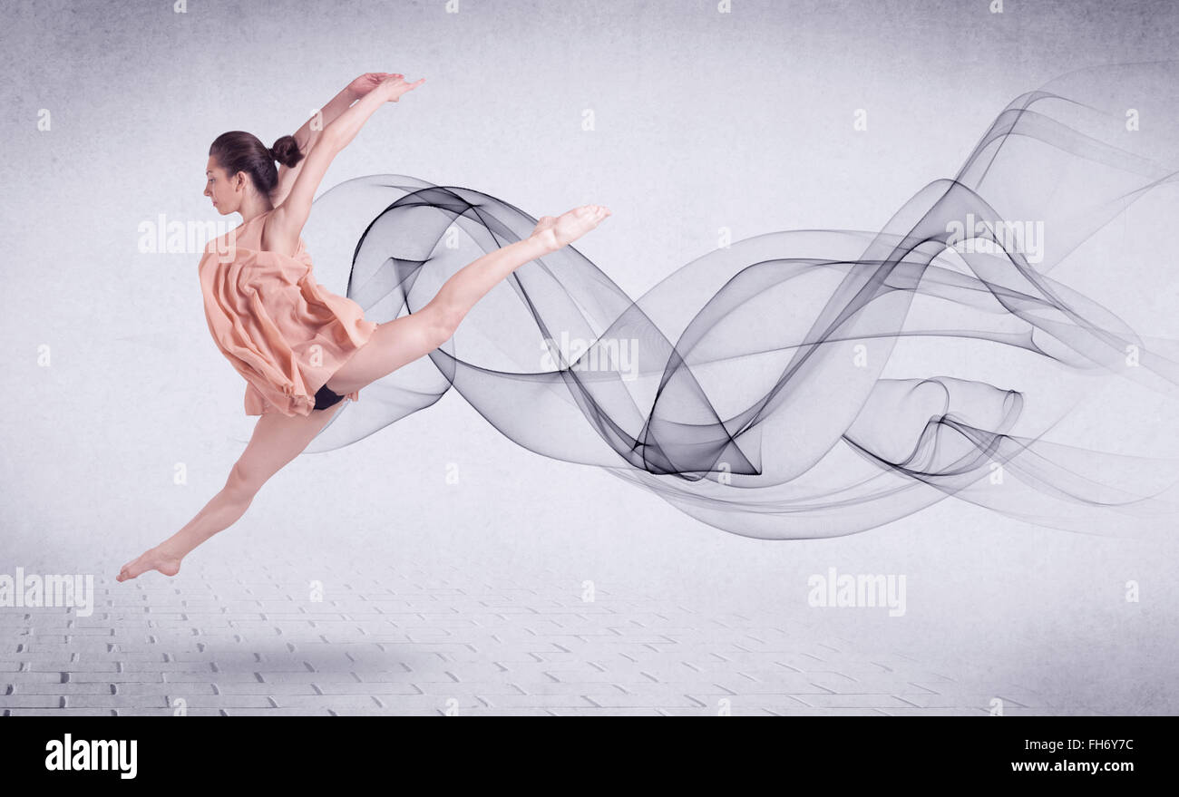 Modern ballet dancer performing with abstract swirl Stock Photo - Alamy