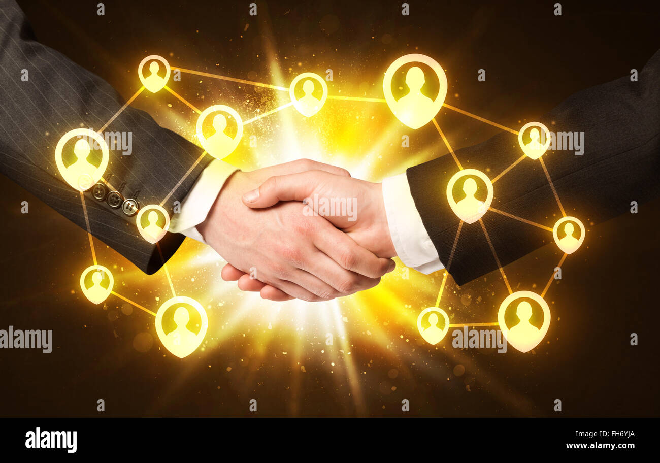 Social netwok connection handshake Stock Photo - Alamy