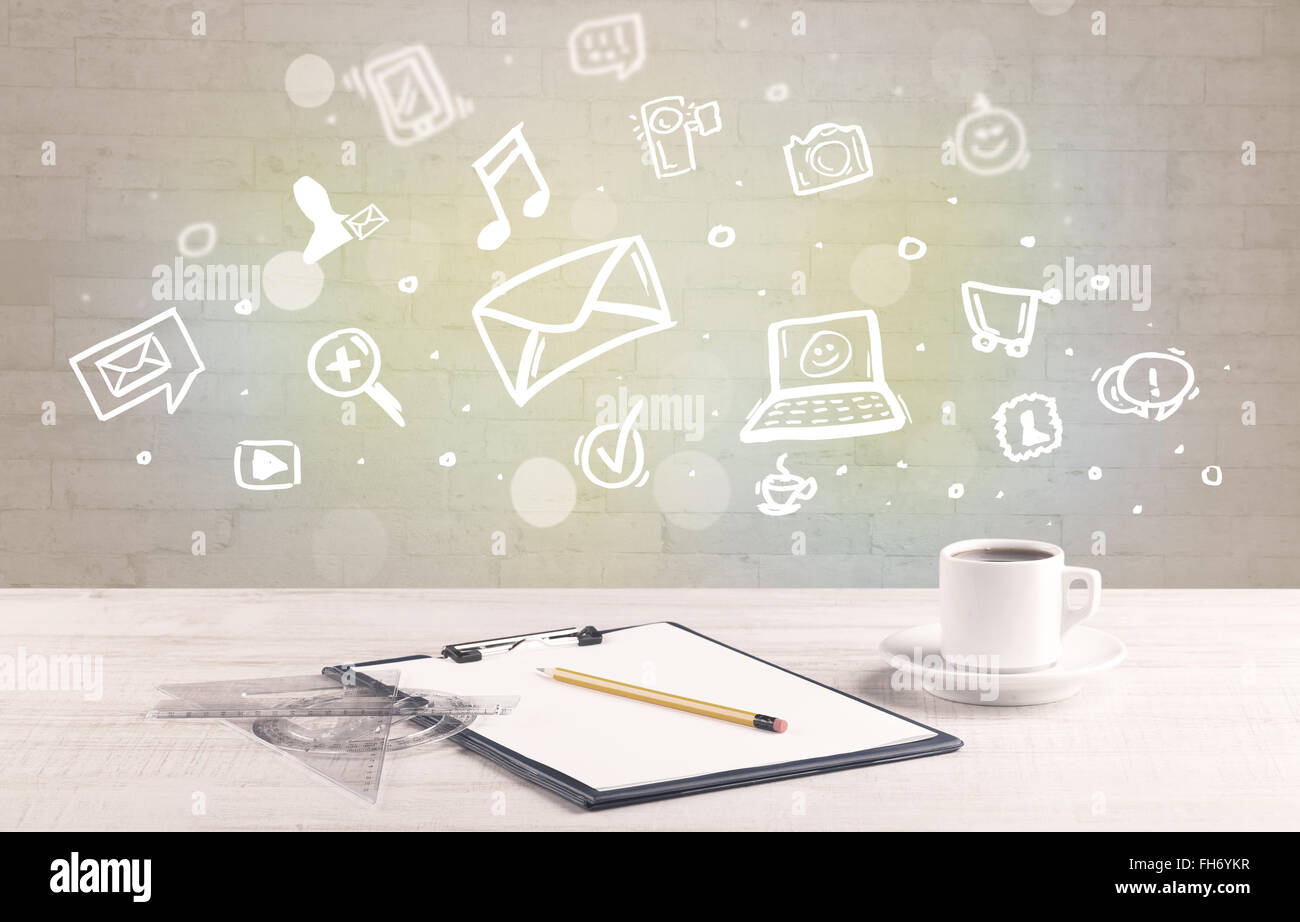 Office desk with communication icons Stock Photo - Alamy