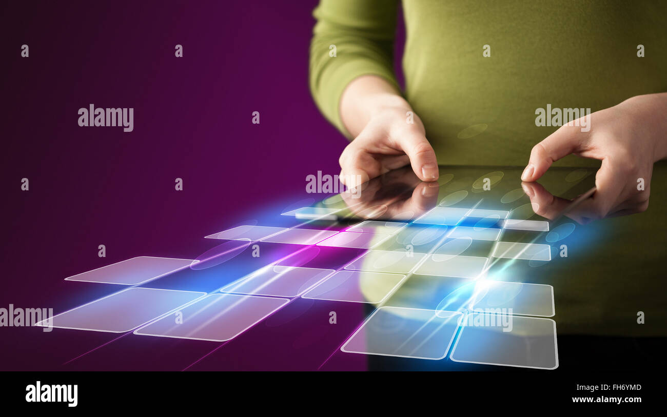 Close up of hand holding tablet with cyber application Stock Photo - Alamy