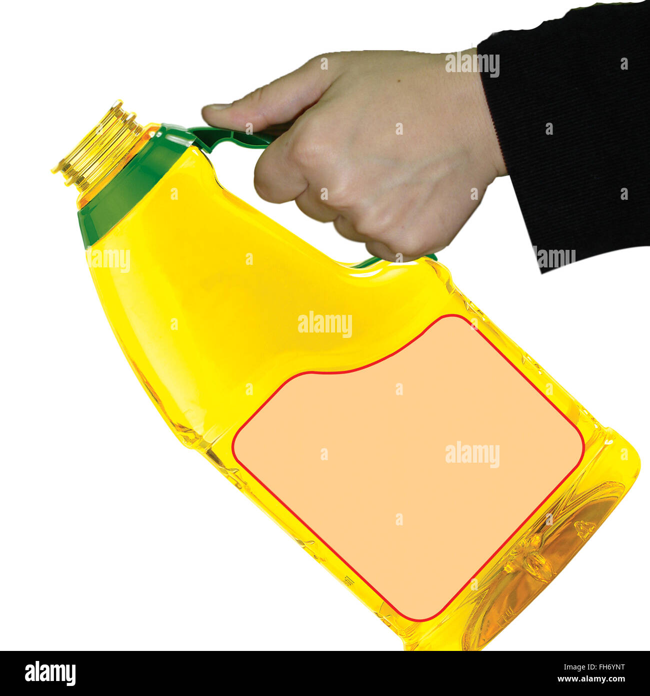 unlabeled blank bottle in a hand for designing sunflower oil label on ...