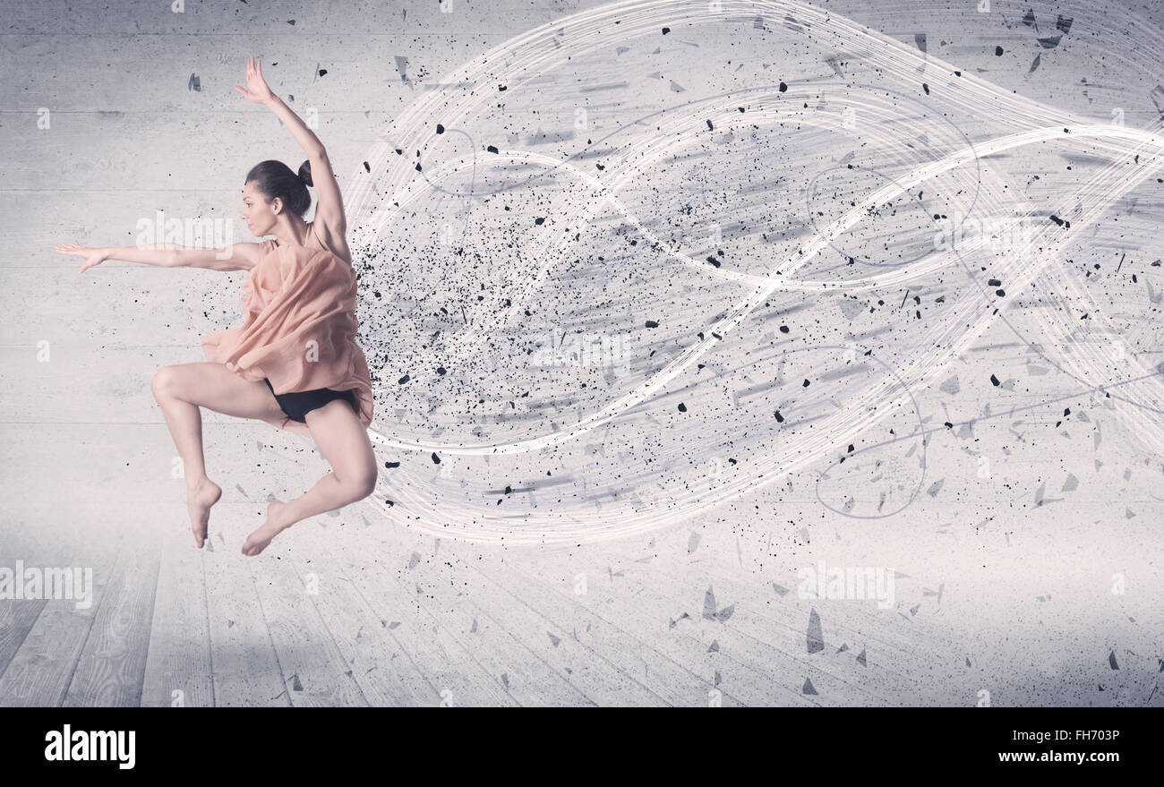 Performance ballet dancer jumping with energy explosion particles Stock ...