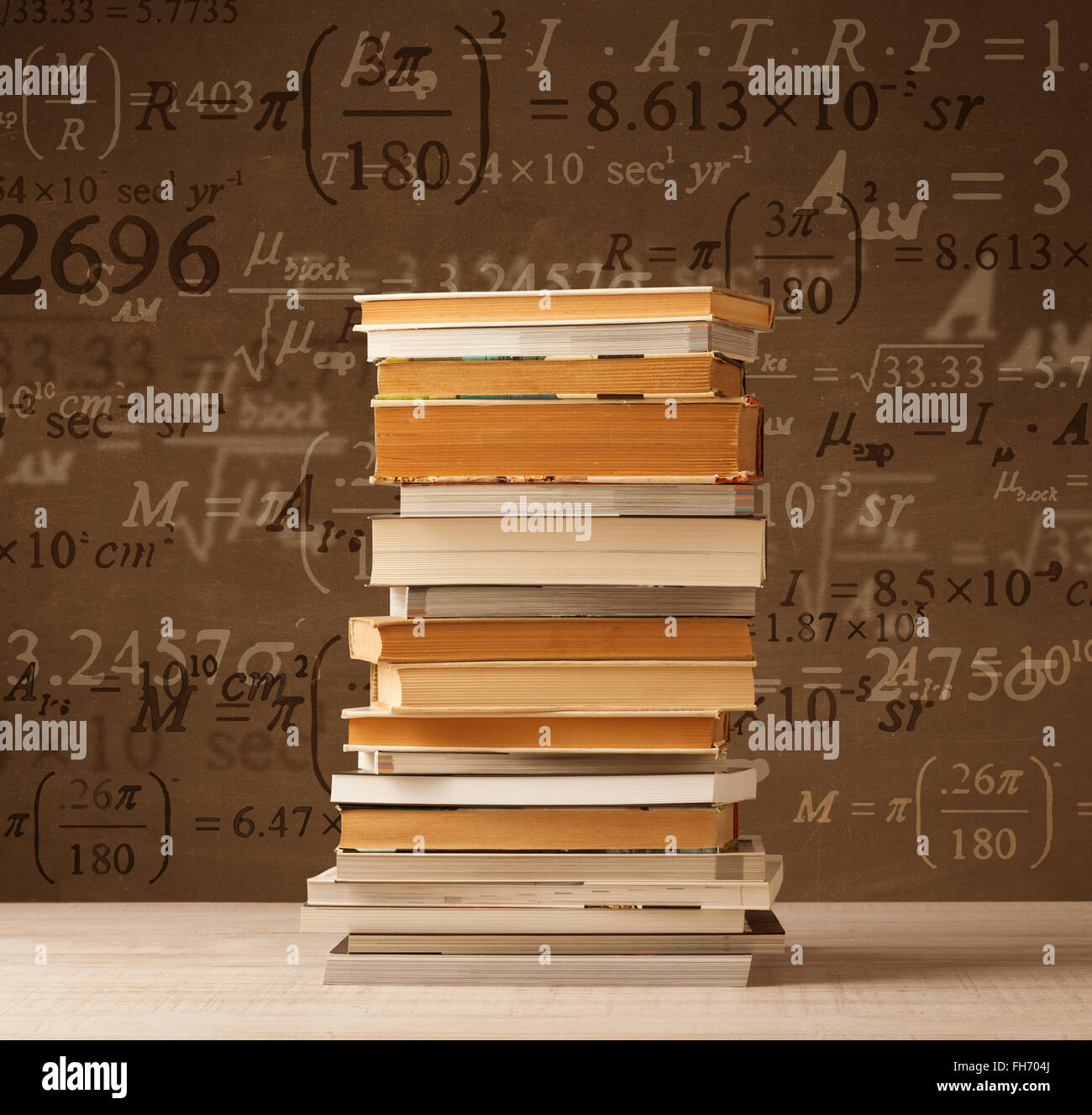 Books on vintage background with math formulas Stock Photo - Alamy