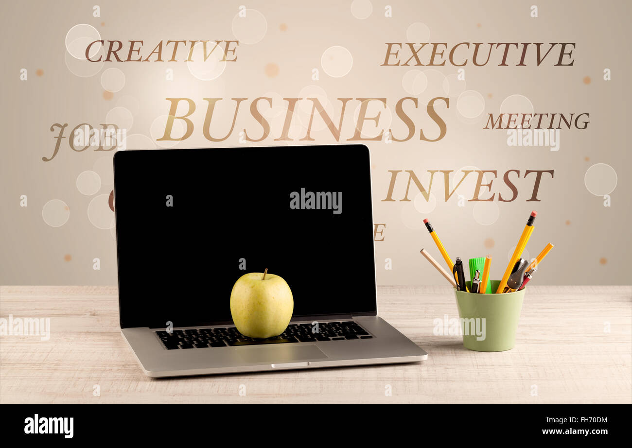 Business office desk with writing on wall Stock Photo - Alamy