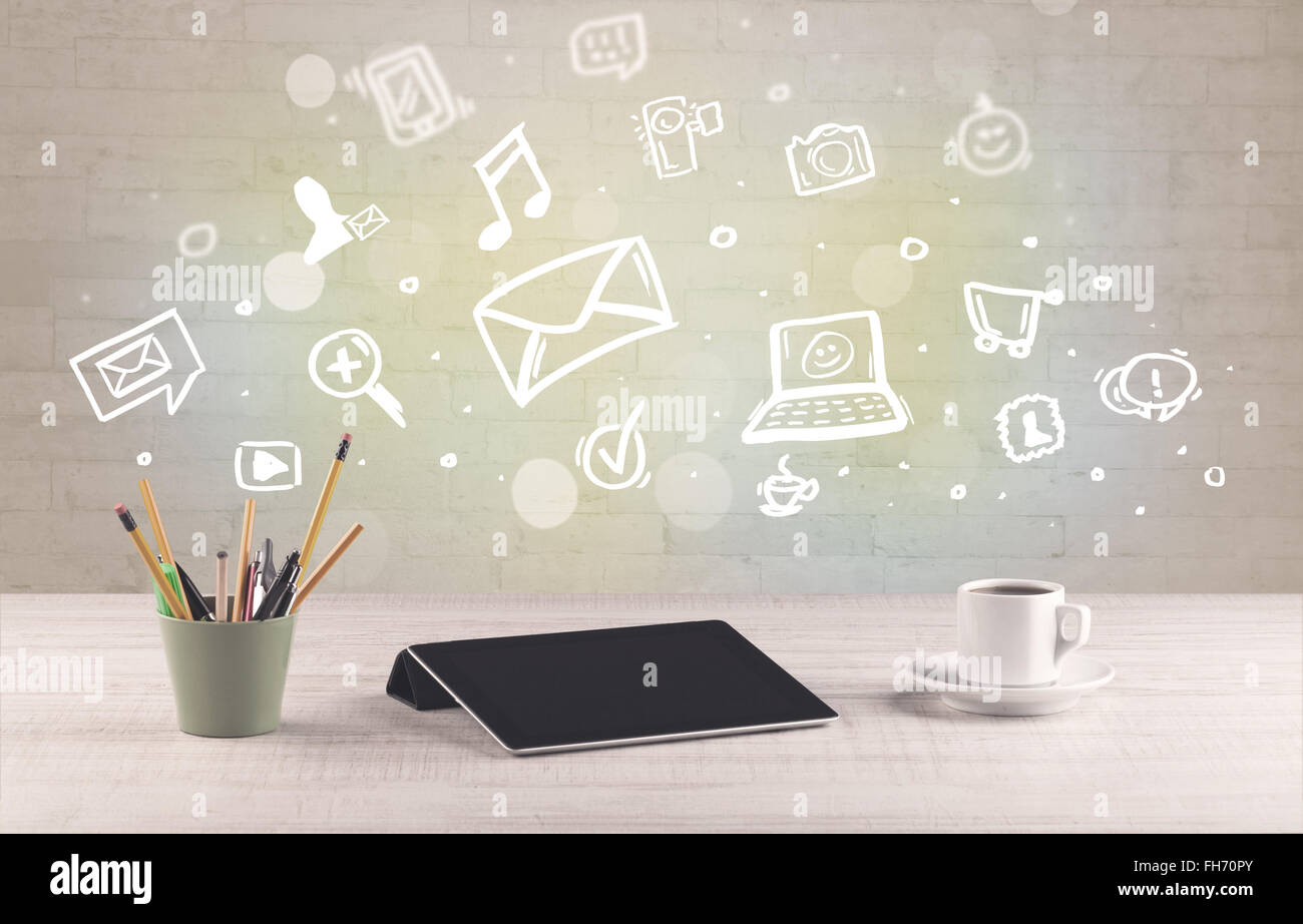 Office desk with communication icons Stock Photo - Alamy