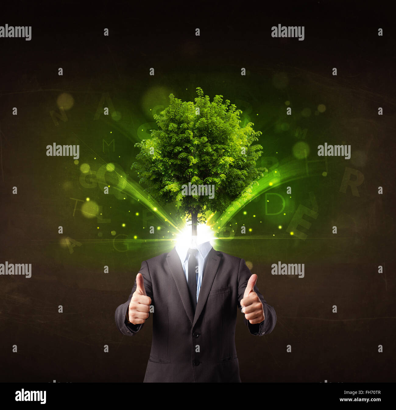 Man with green tree head concept Stock Photo - Alamy