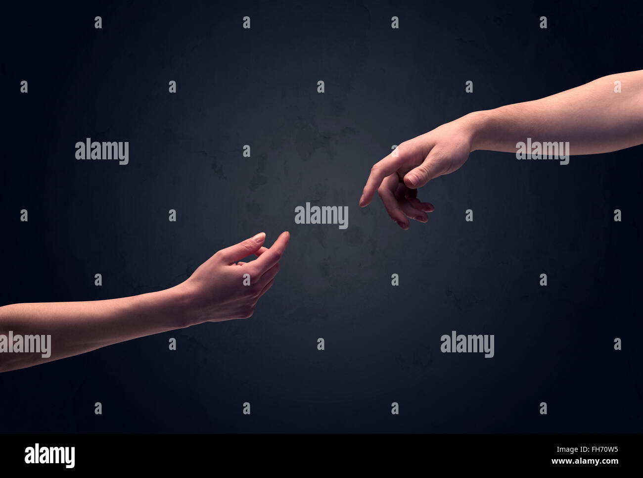 Hands reaching for one another hi-res stock photography and images - Alamy