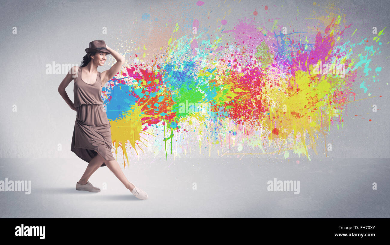 Young colorful street dancer with paint splash Stock Photo - Alamy