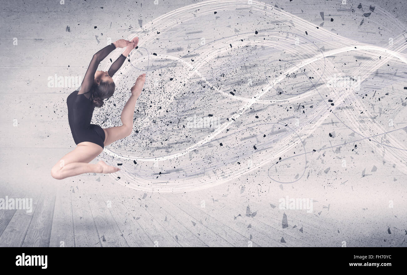 Performance ballet dancer jumping with energy explosion particles Stock ...