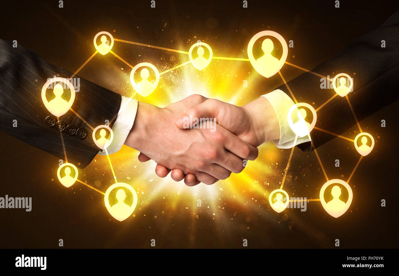 Social netwok connection handshake Stock Photo - Alamy