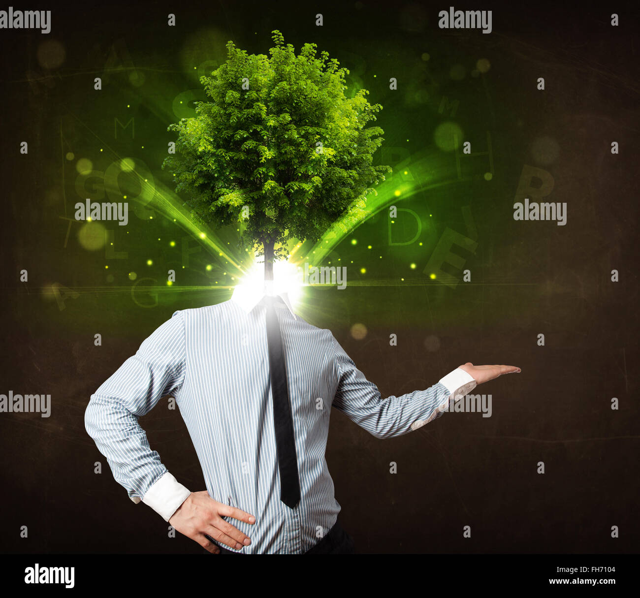 Man with green tree head concept Stock Photo - Alamy