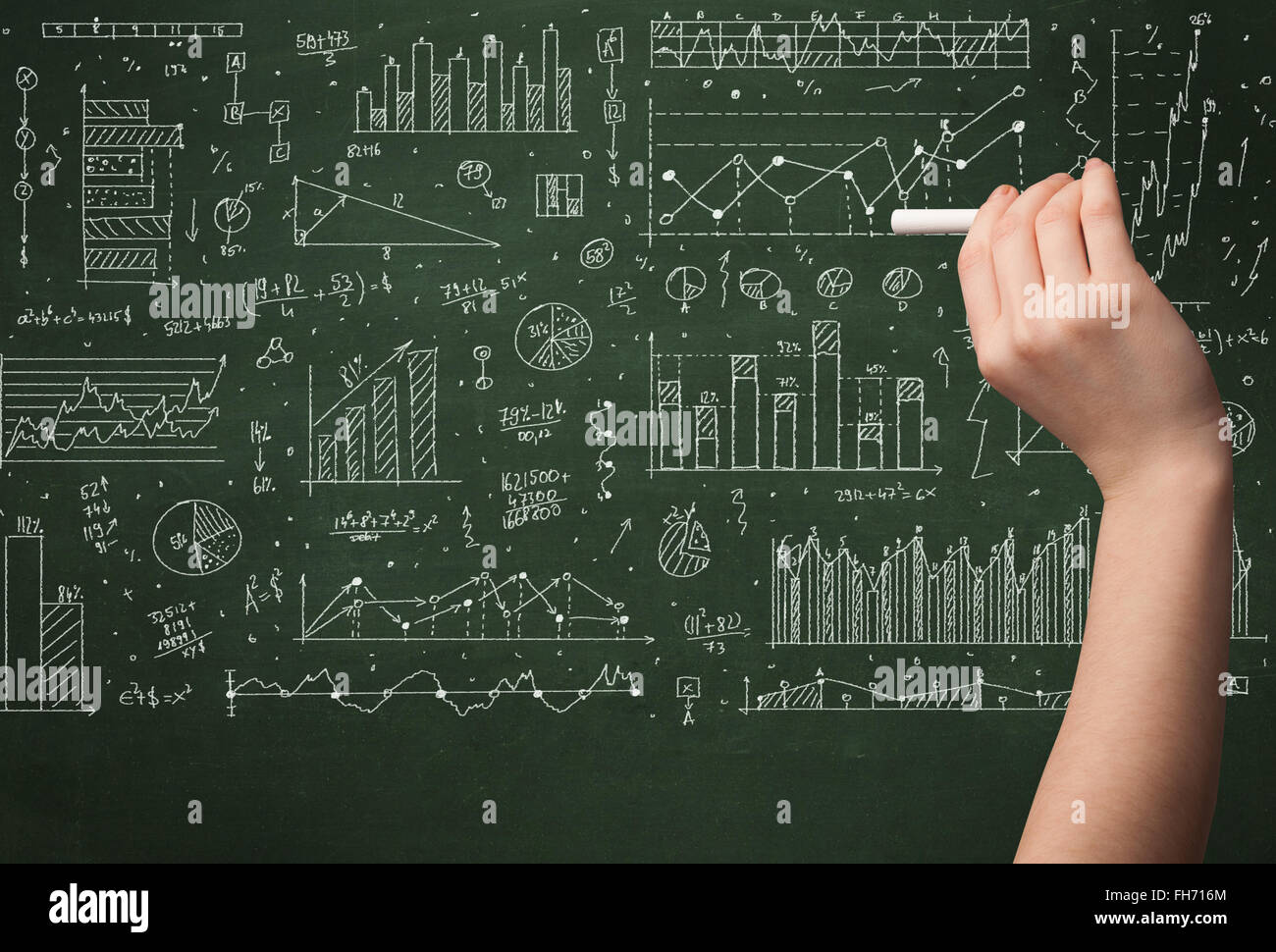 A business person drawing data on chalkboard Stock Photo - Alamy