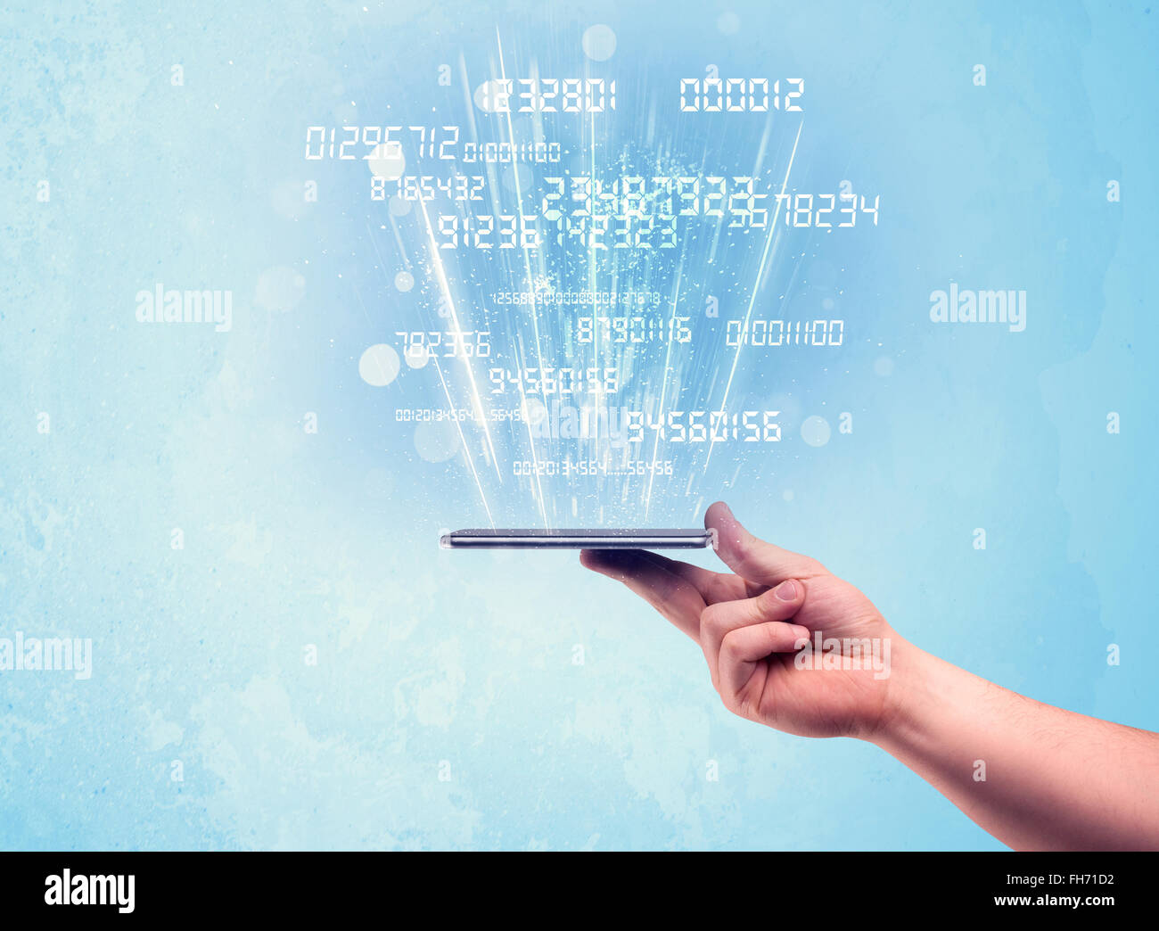 Hand holding phone with digital numbers Stock Photo - Alamy