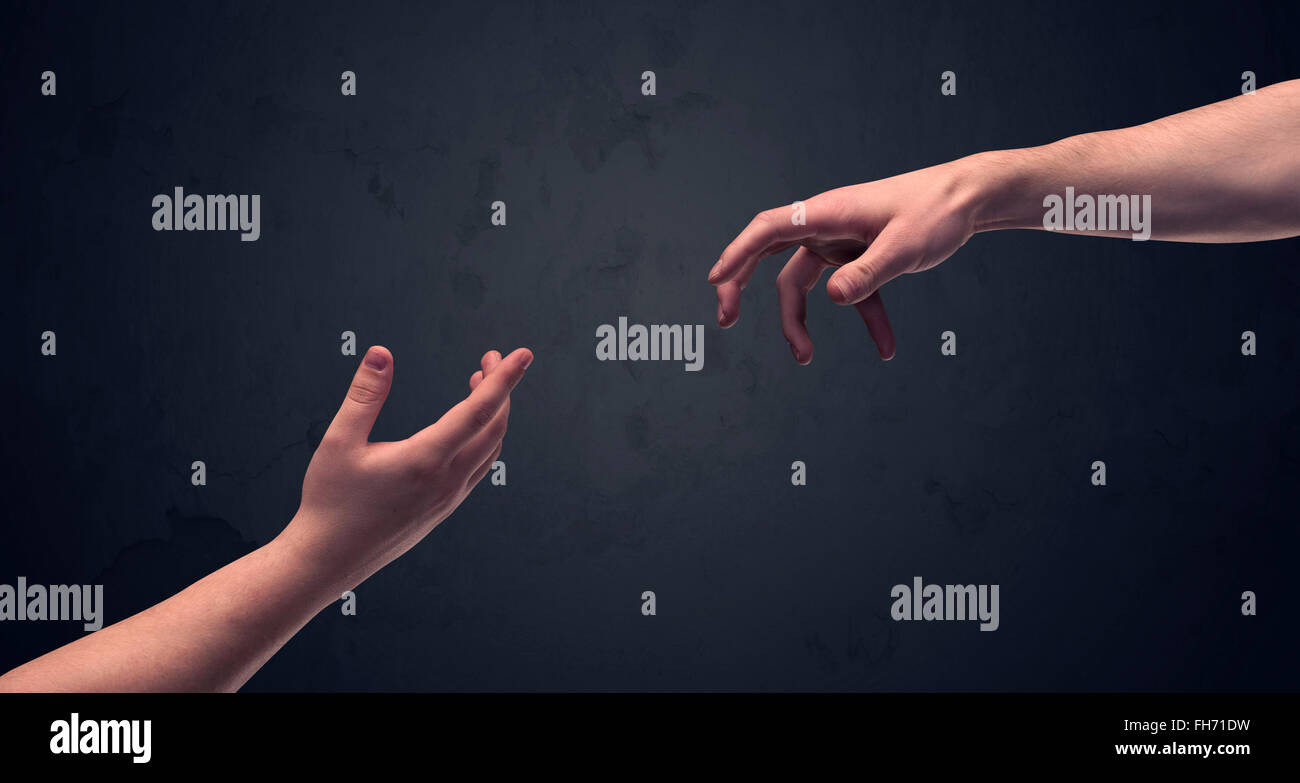 Hand about to touch another one Stock Photo - Alamy